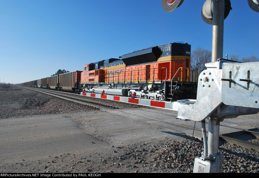 BNSF 9090passes me by with the town of Hampton, Nebraska in the background as she rolls westbound!!!